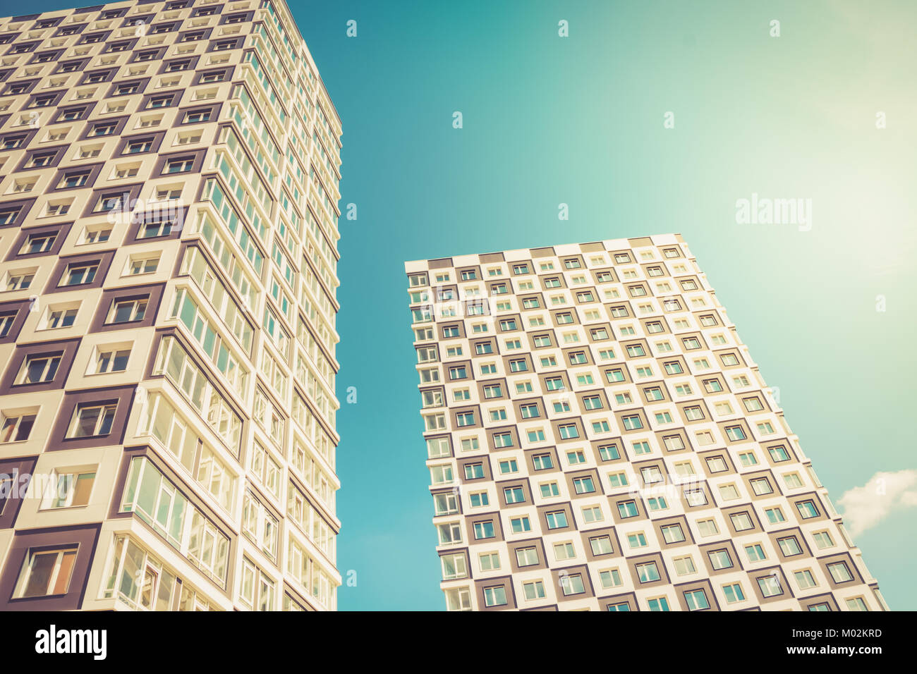 Modern and new apartment building. Photo of tall block of flats against ...