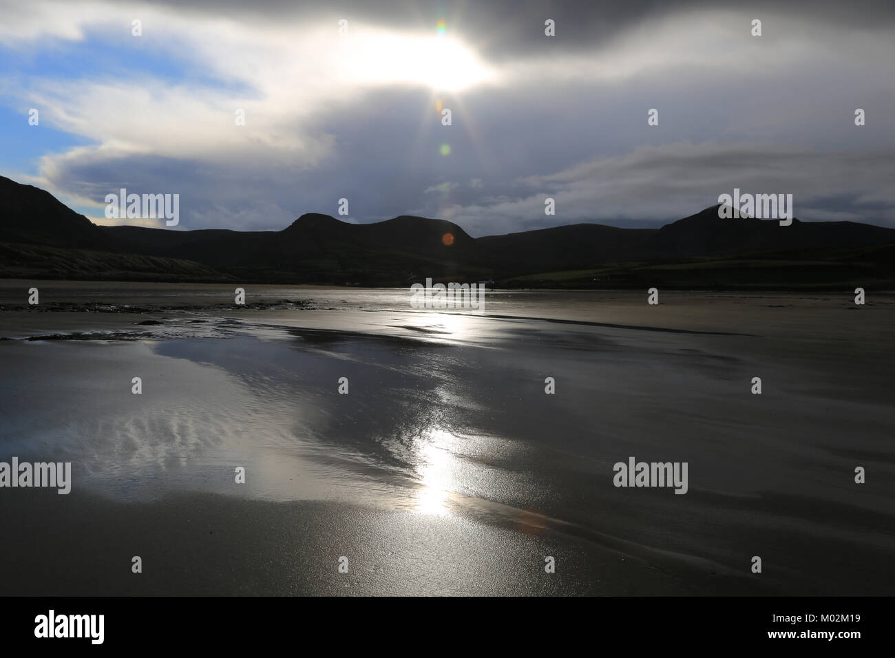 calm sky reflections on seashore wild atlantic way, county kerry ...