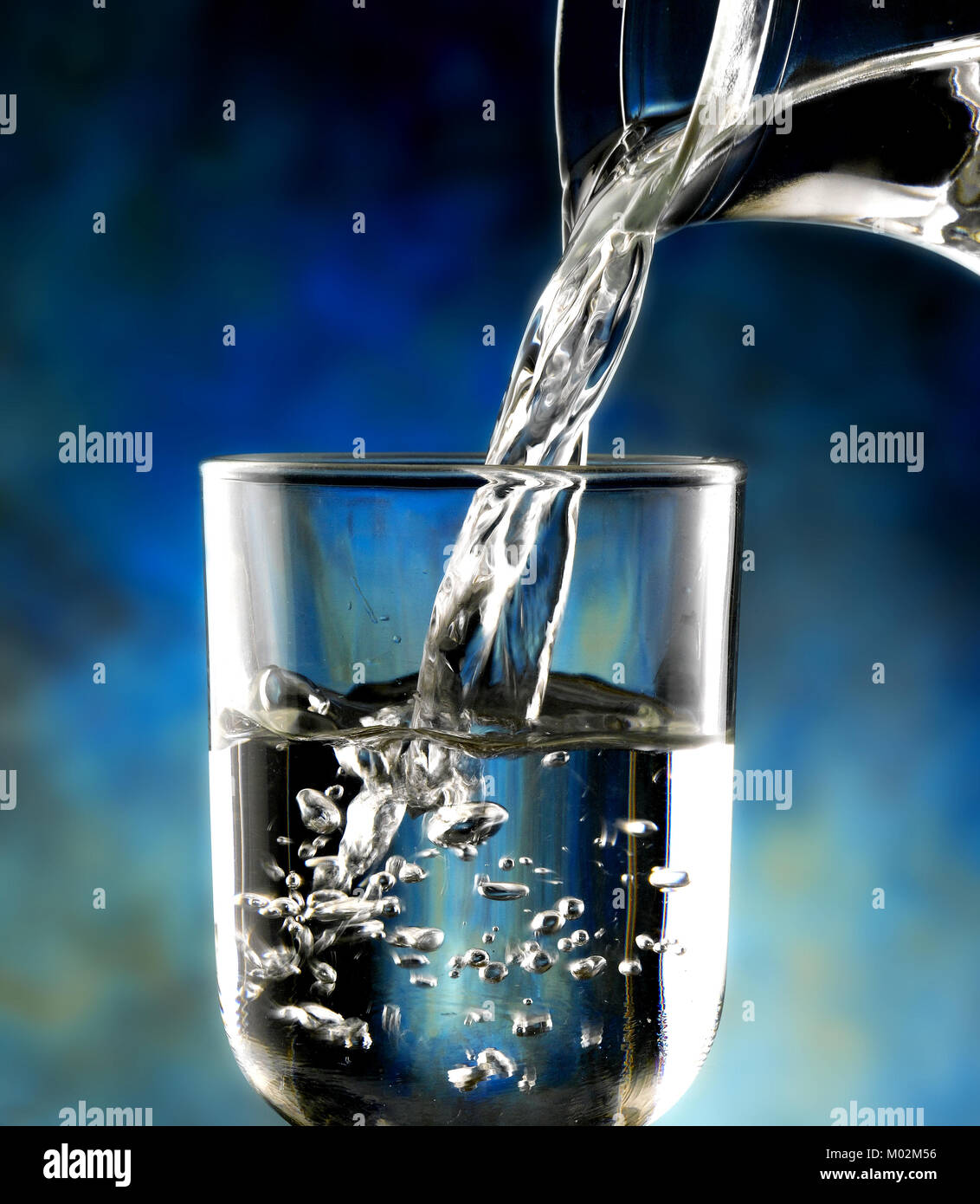 water poured into the glass Stock Photo - Alamy