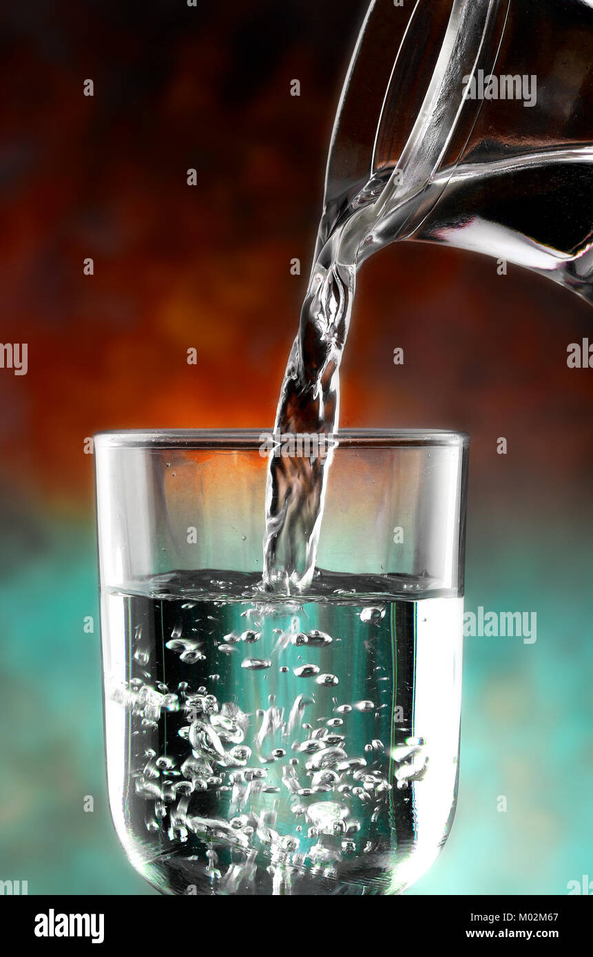 water poured into the glass Stock Photo - Alamy