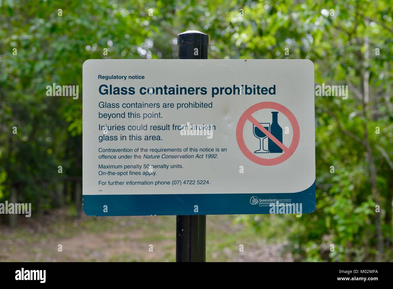 Glass containers prohibited sign with a family walking past, Bowling ...