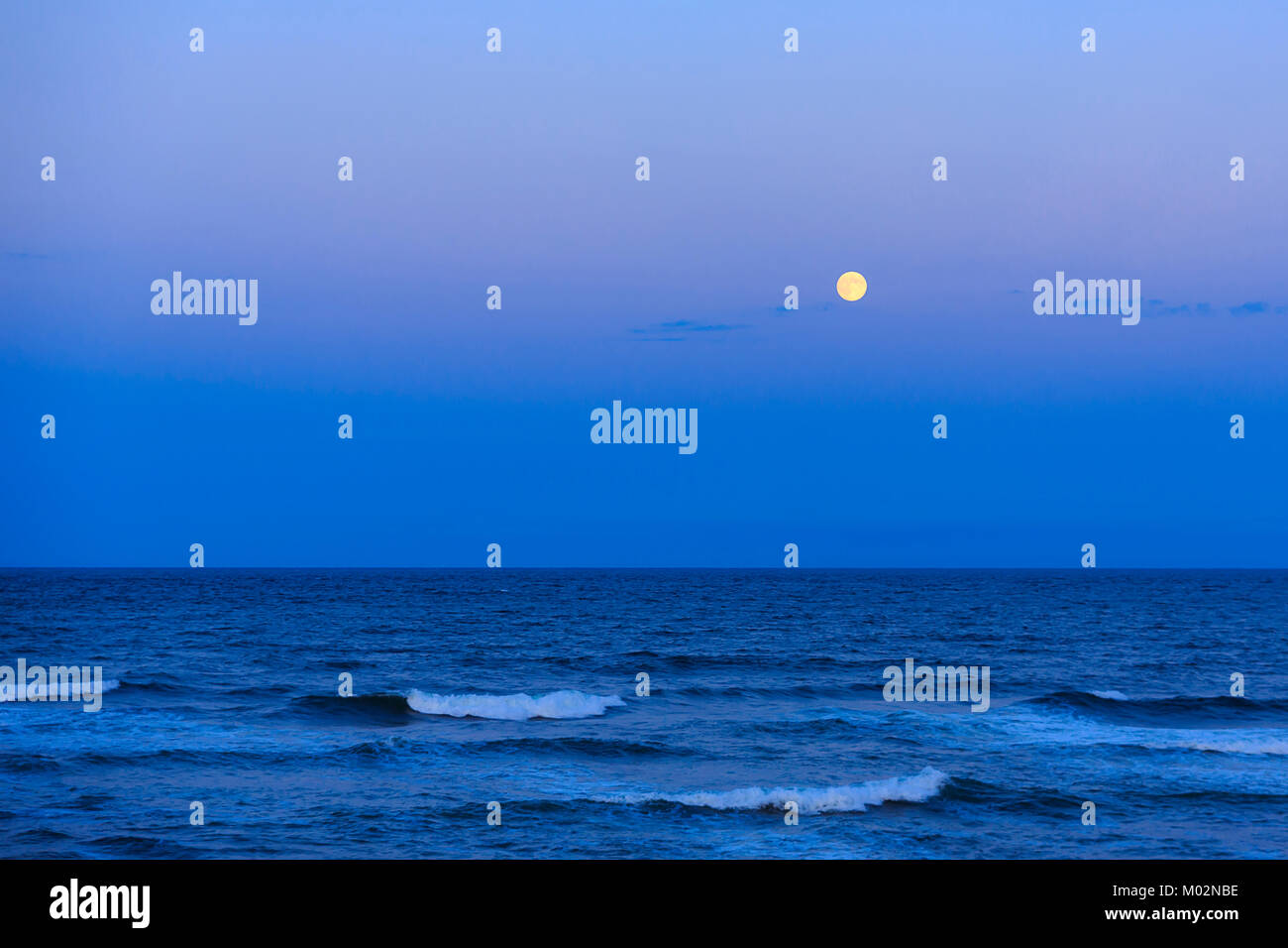New moon over the sea hi-res stock photography and images - Alamy