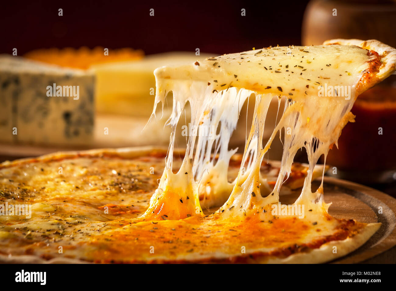 Quattro formaggi cheese pizza hi-res stock photography and images - Alamy