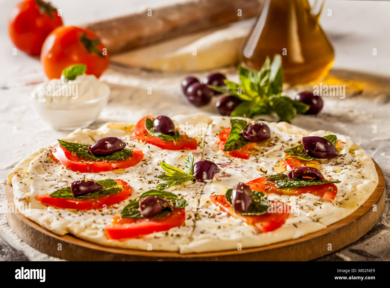 Italian pizza rucola cherry hi-res stock photography and images - Alamy