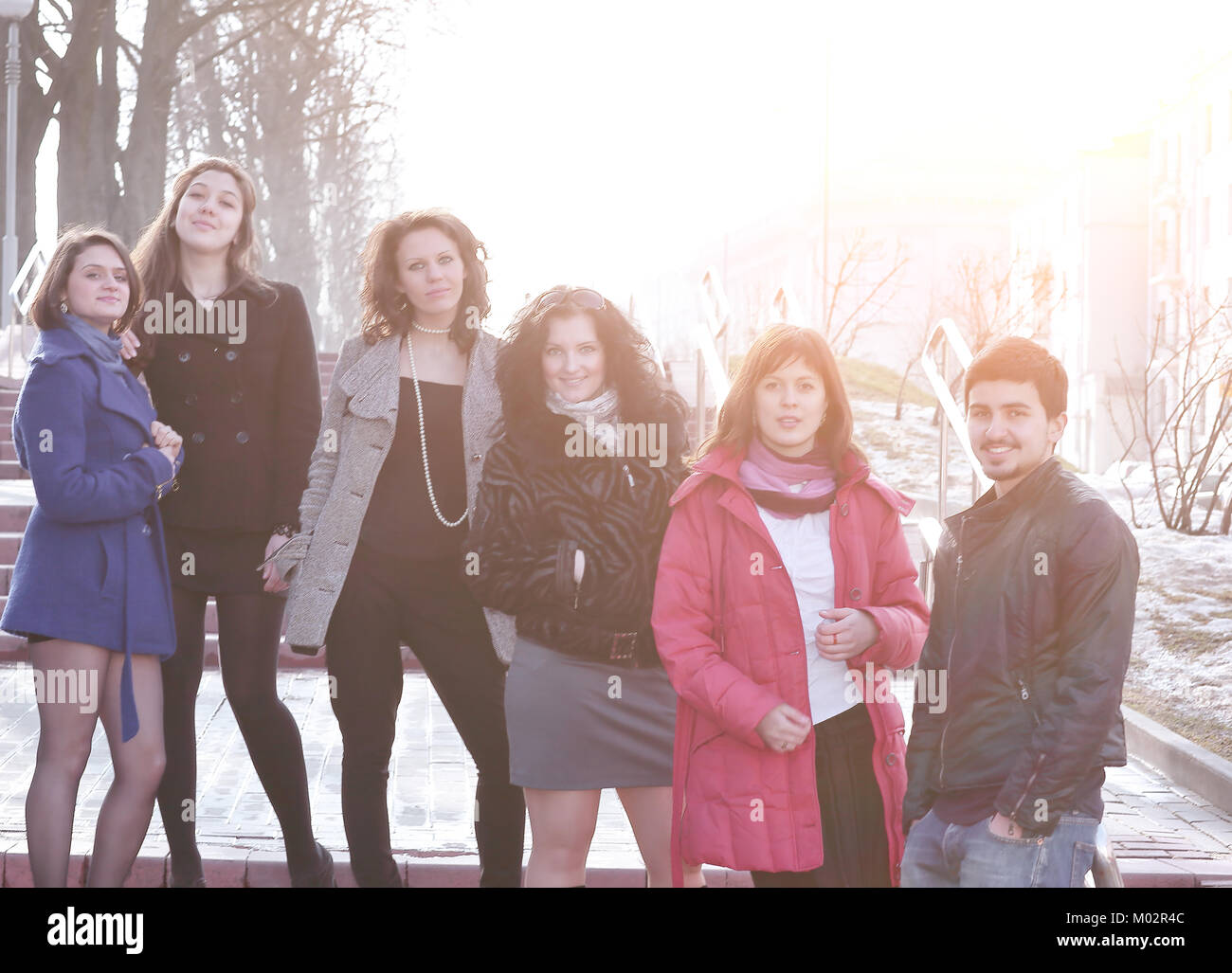 group of students standing on the street Stock Photo - Alamy
