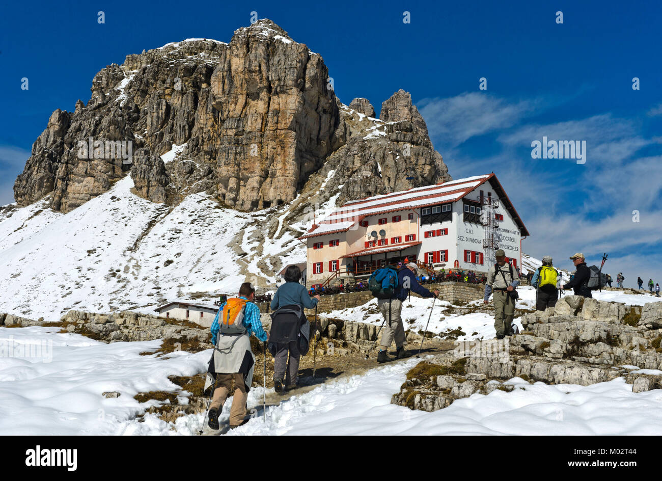 Hikers on the path leading to the refuge of Locatelli (Rifugio ...