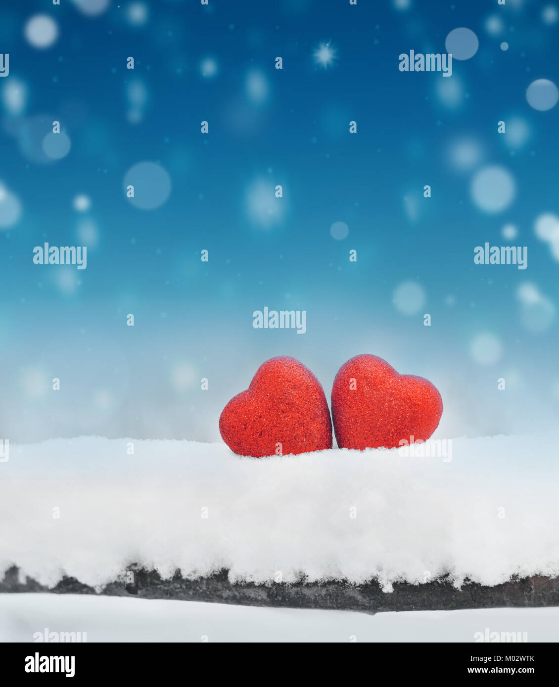 Red heart on snow background. St. Valentine's Day Stock Photo - Alamy