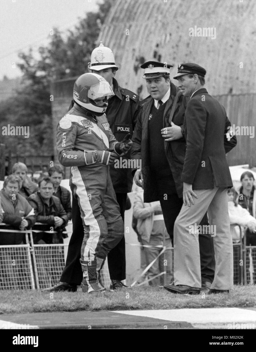 Marshalls assistTony Rutter after he fell from his Ducati at ...
