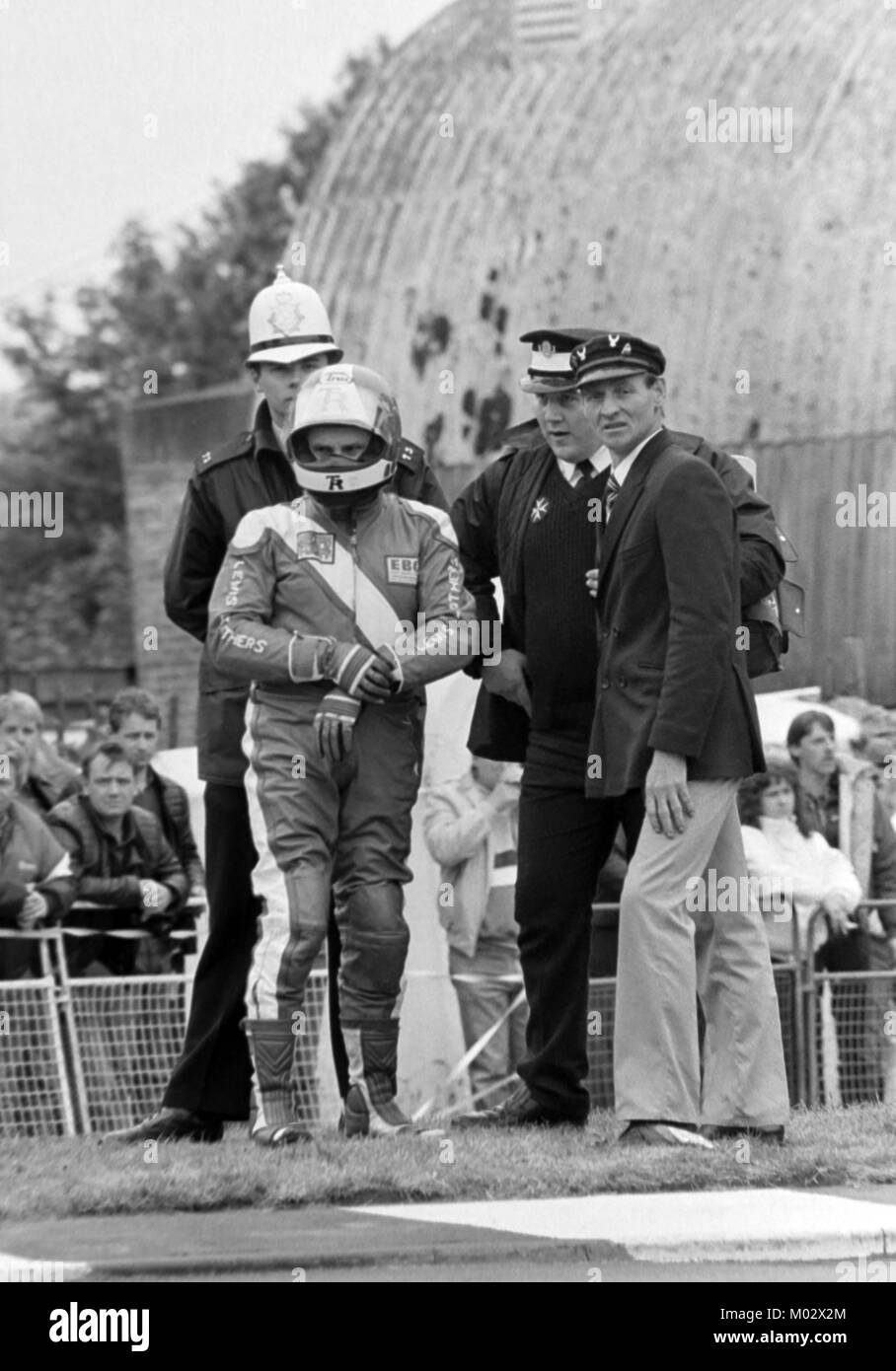 Marshalls assistTony Rutter after he fell from his Ducati at ...
