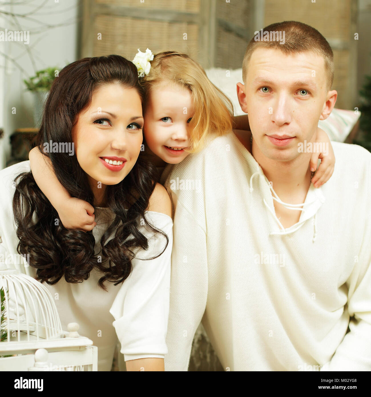 Child, mother and father - smiling family Stock Photo - Alamy