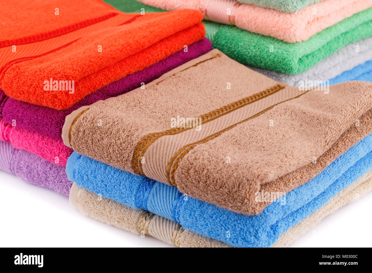 Colorful towels stack closeup picture Stock Photo - Alamy