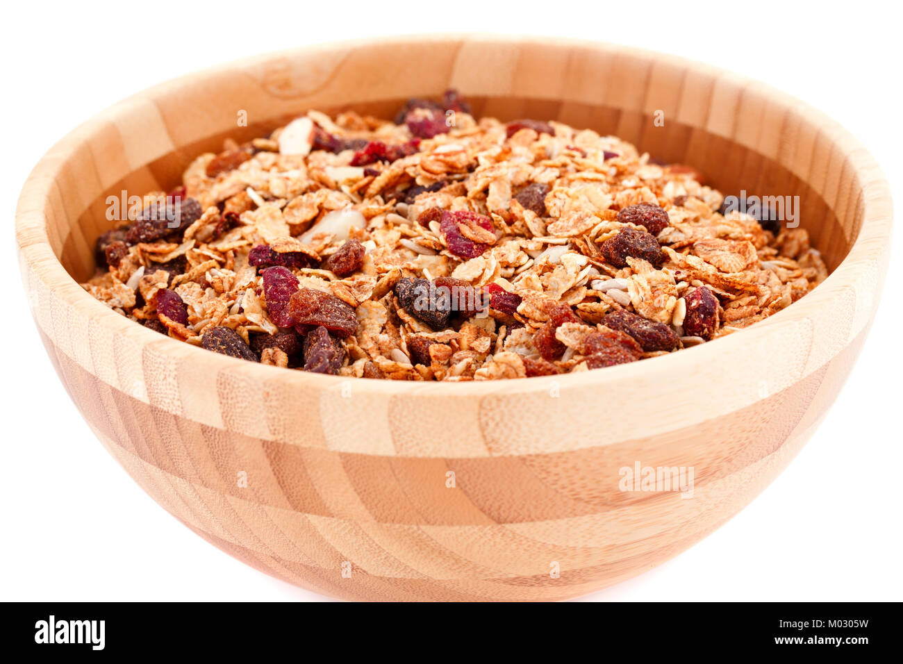 Muesli in the bowl isolated on white background Stock Photo - Alamy