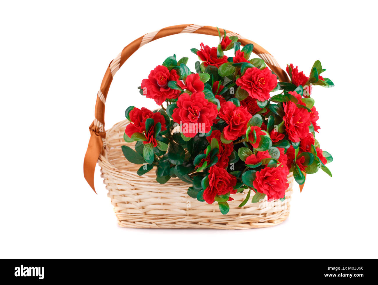 Red fabric flowers in wicker basket isolated on white background Stock ...