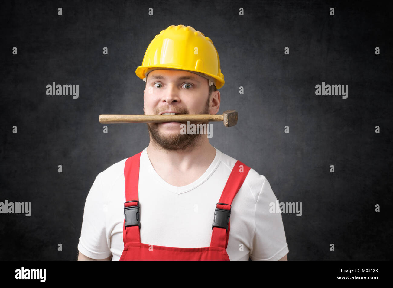 Insane construction worker Stock Photo - Alamy