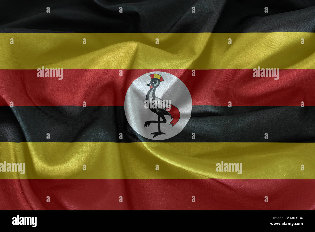 Uganda flag pattern on the fabric texture Stock Photo - Alamy