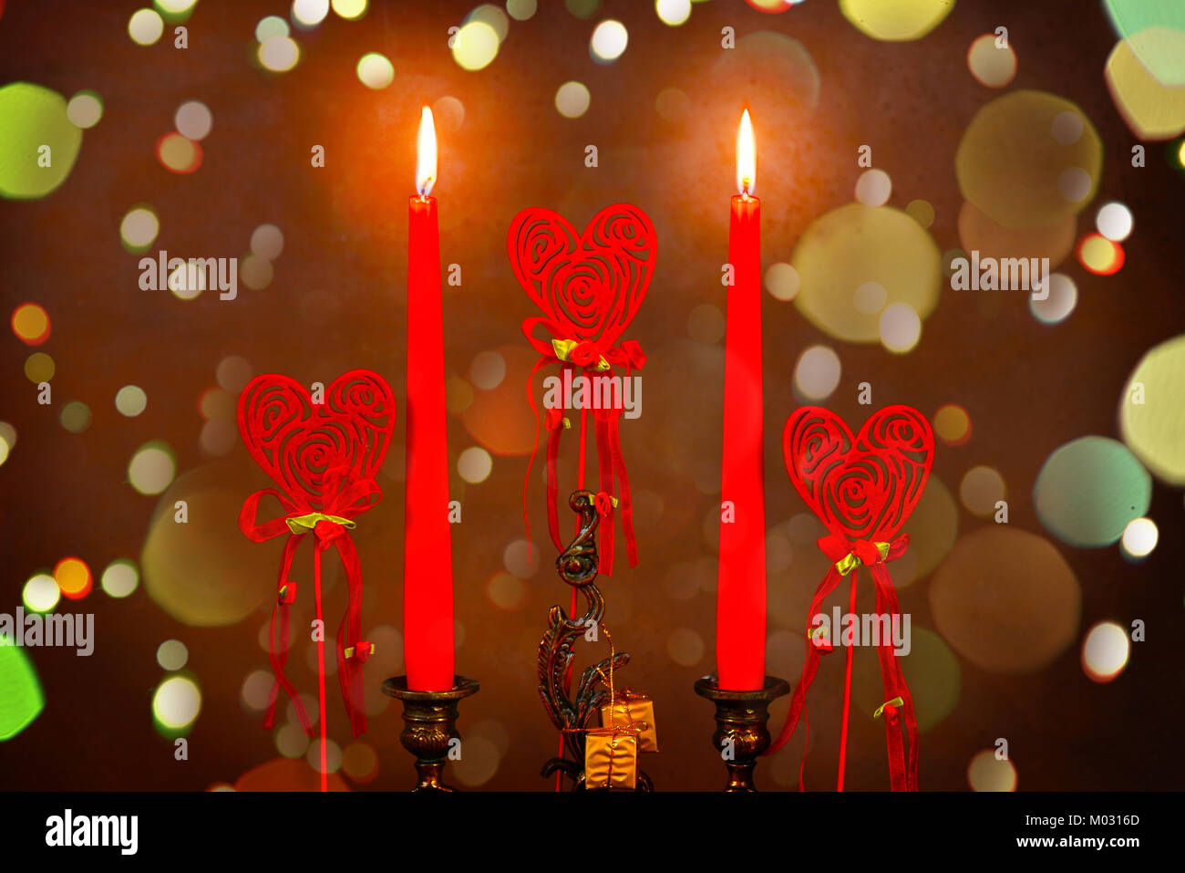 Red lighted candles hi-res stock photography and images - Alamy