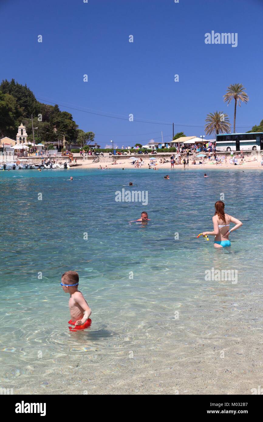 CORFU, GREECE - JUNE 2, 2016: People enjoy the beach in Paleokastritsa ...