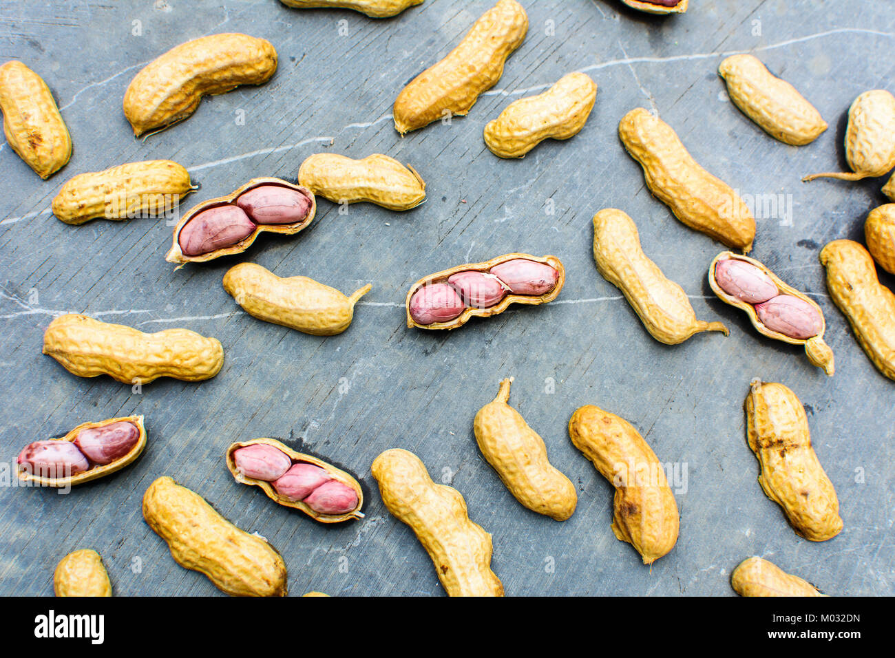 Opened peanuts pattern isolated on the rock background Stock Photo - Alamy