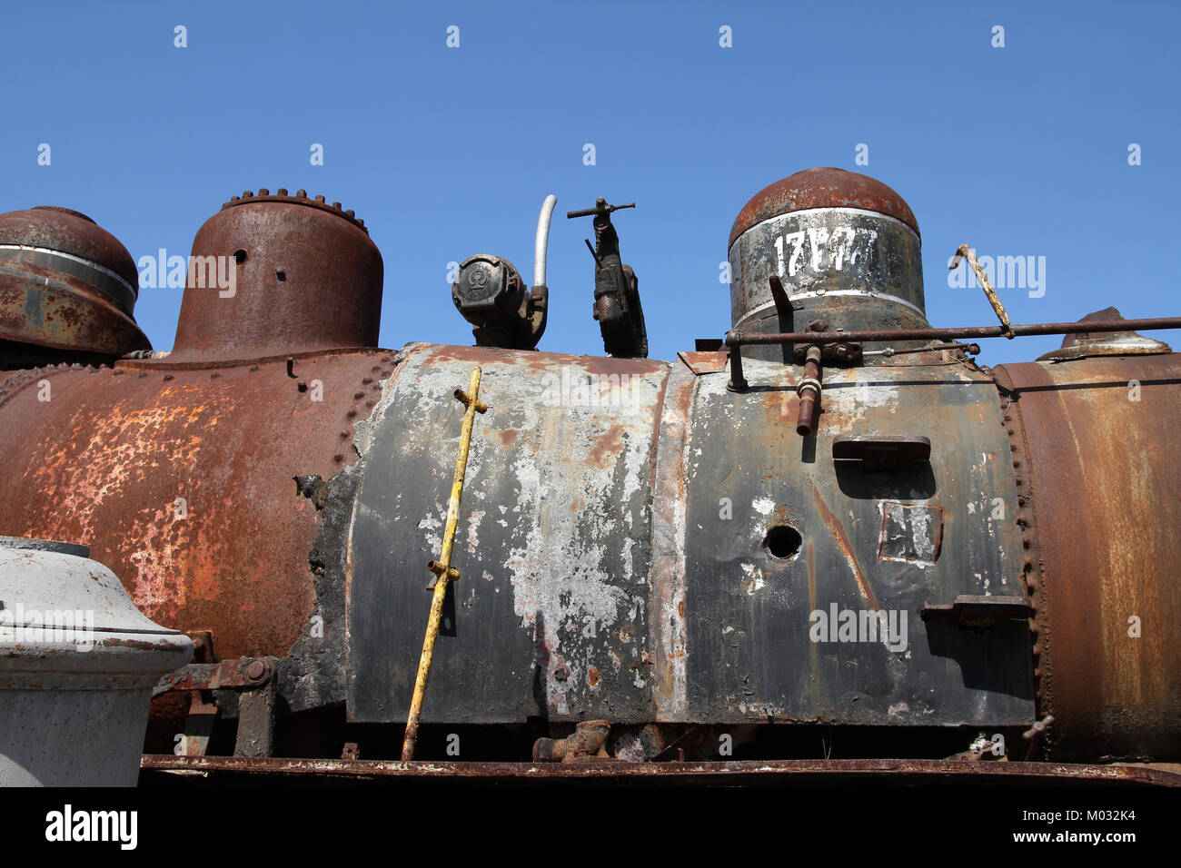 Close up of an old, rusty steam locomotive ready to be scrapped in ...