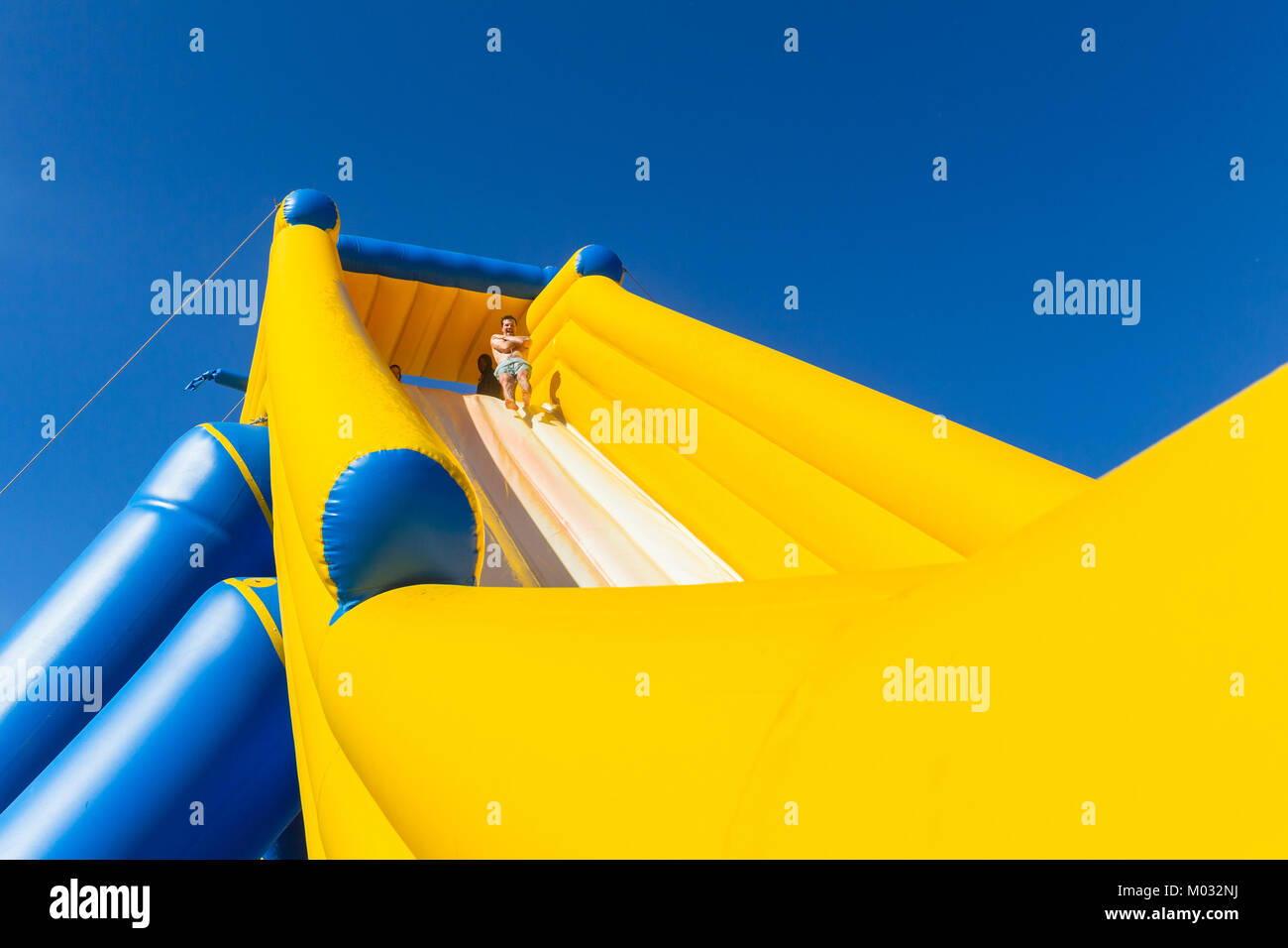 Man water slide hi-res stock photography and images - Alamy