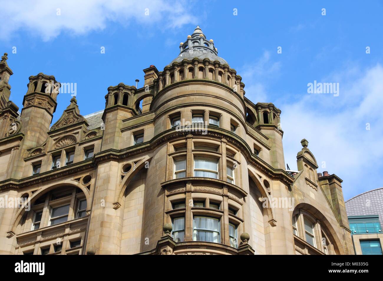 Manchester - city in North West England (UK). Old apartment building ...