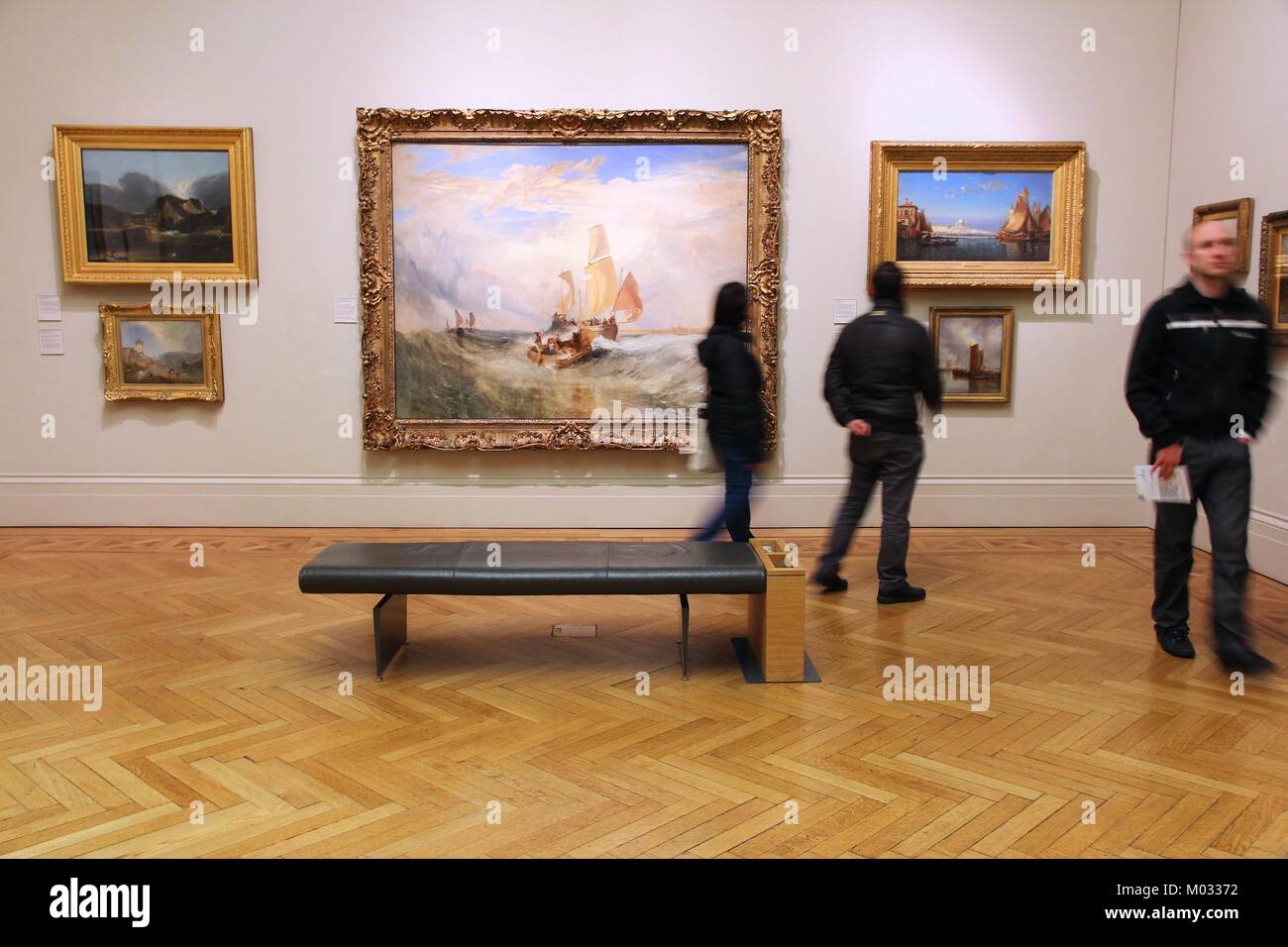 MANCHESTER, UK - APRIL 21: People visit famous Manchester Art Gallery ...