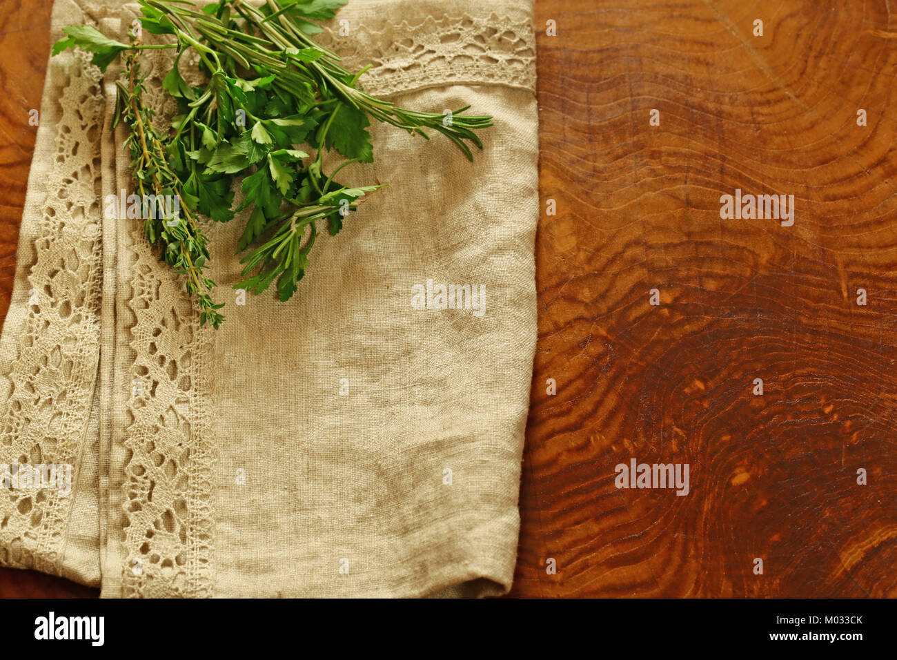 wooden kitchen table background with napkin Stock Photo - Alamy