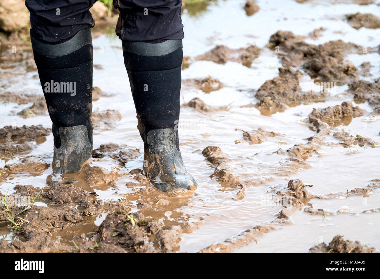 Woman wearing wellington boots hi-res stock photography and images - Alamy