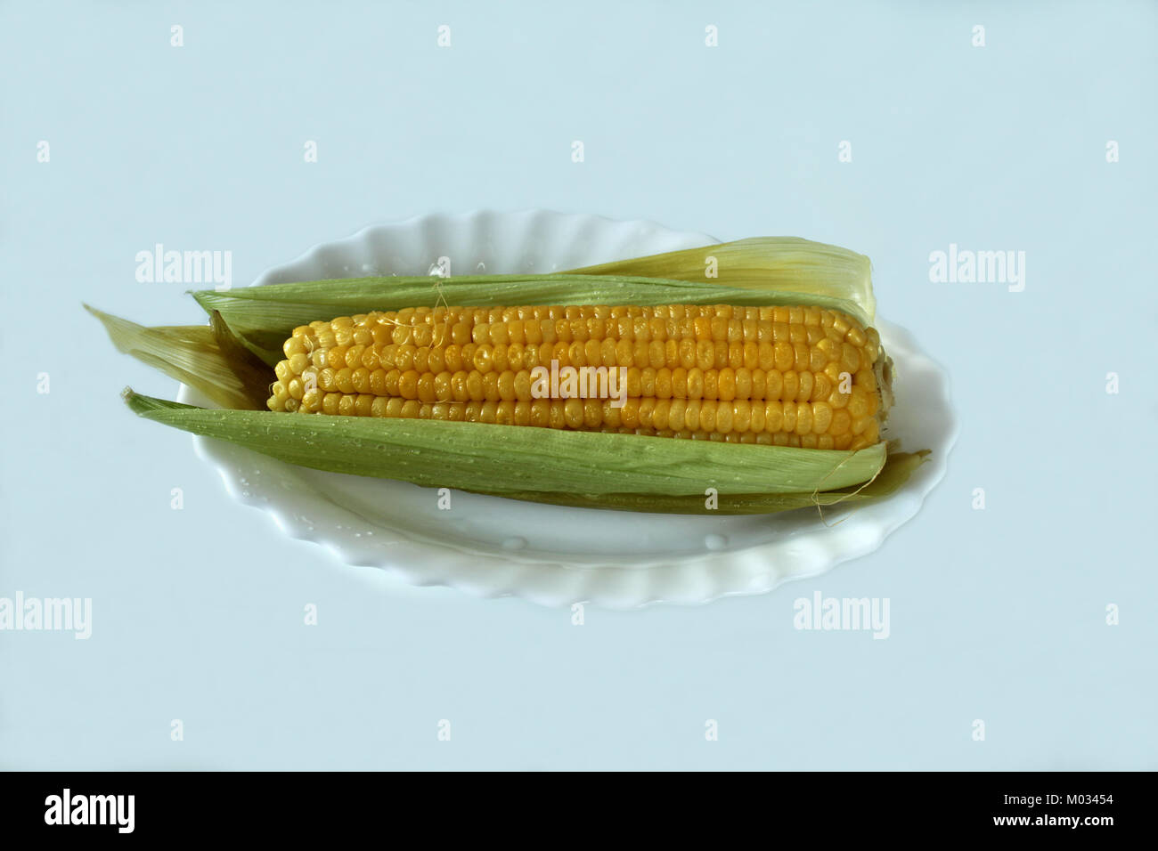 Boiled corn kernels in white hi-res stock photography and images - Alamy