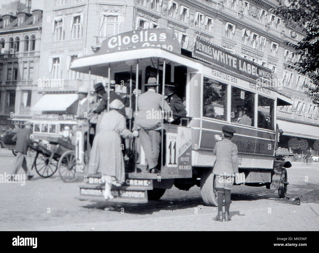 A historical photograph of a bus in Copenhagen, Denmark, from 1922 ...