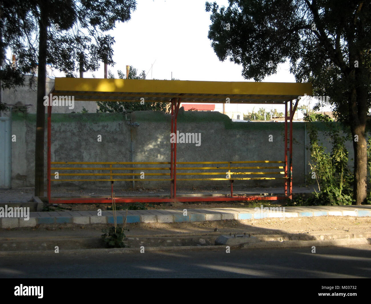 This photograph captures a bus stop located on Khayyam Boulevard in ...