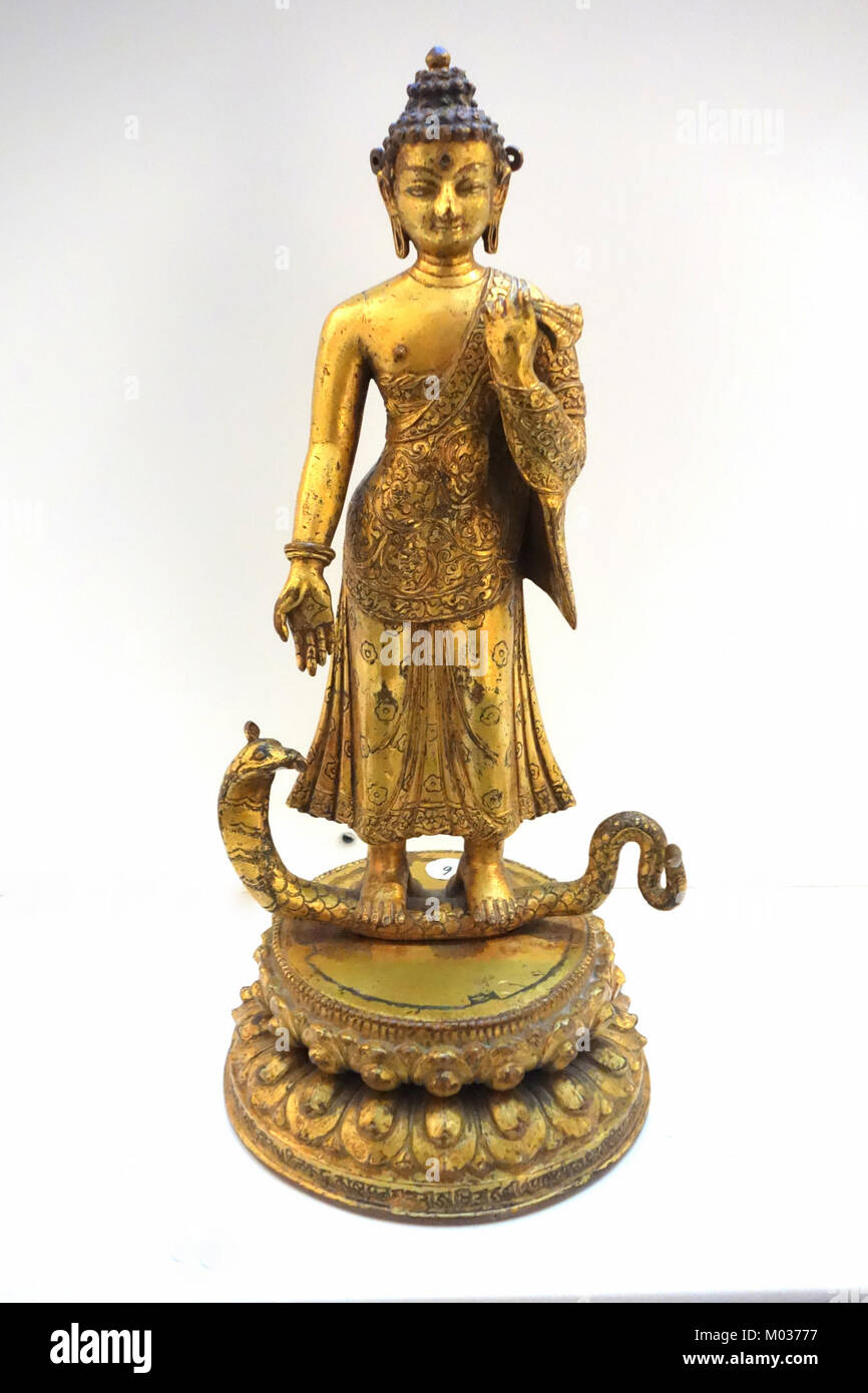 This gilt bronze sculpture from Tibet, depicting Buddha standing on a ...