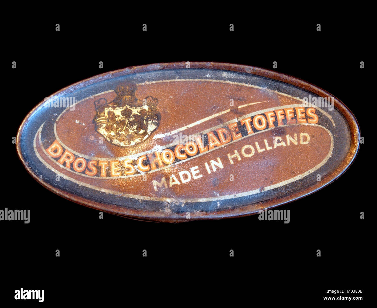 Bruine ovaal cylindervormig Droste chocolade tofees blik, foto5 Stock ...