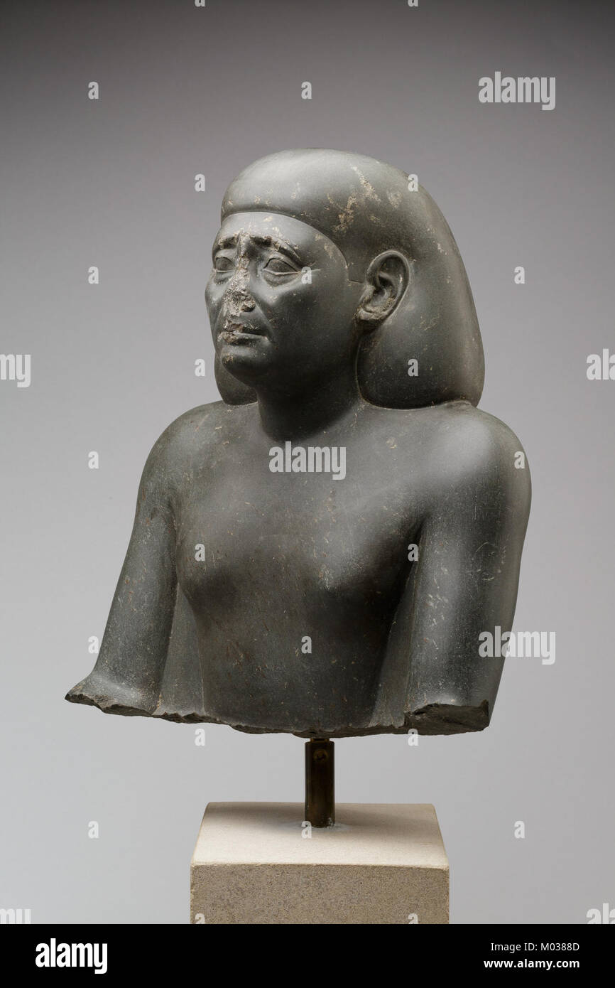 The bust depicts an official, likely a public figure, captured in ...