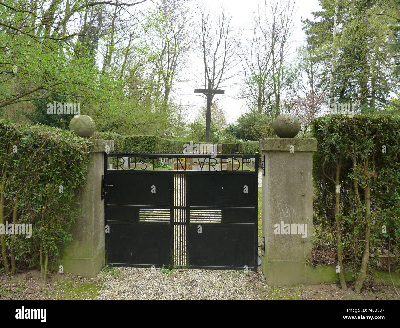 A photograph capturing the serene atmosphere of Cadier en Keer Cemetery ...