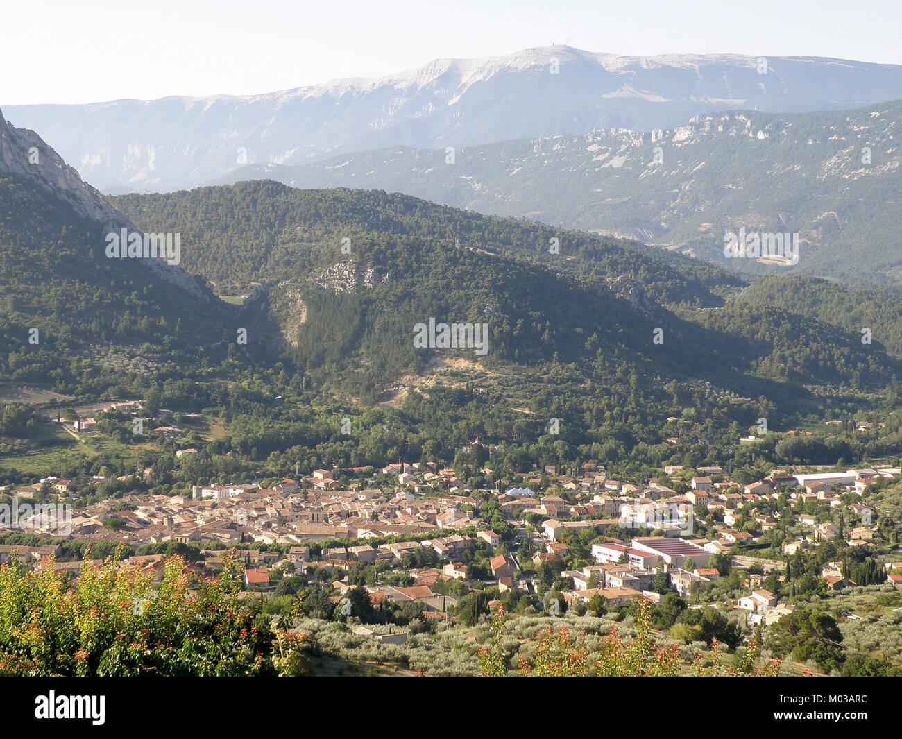 This postcard offers a view of Buis-les-Baronnies, a commune in ...
