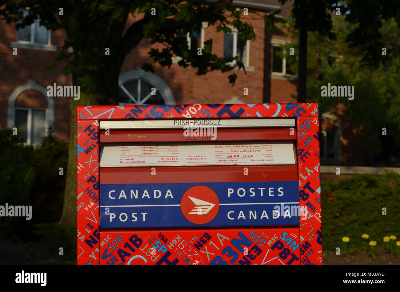 This image depicts a Canada Post mailbox, which serves as a collection ...