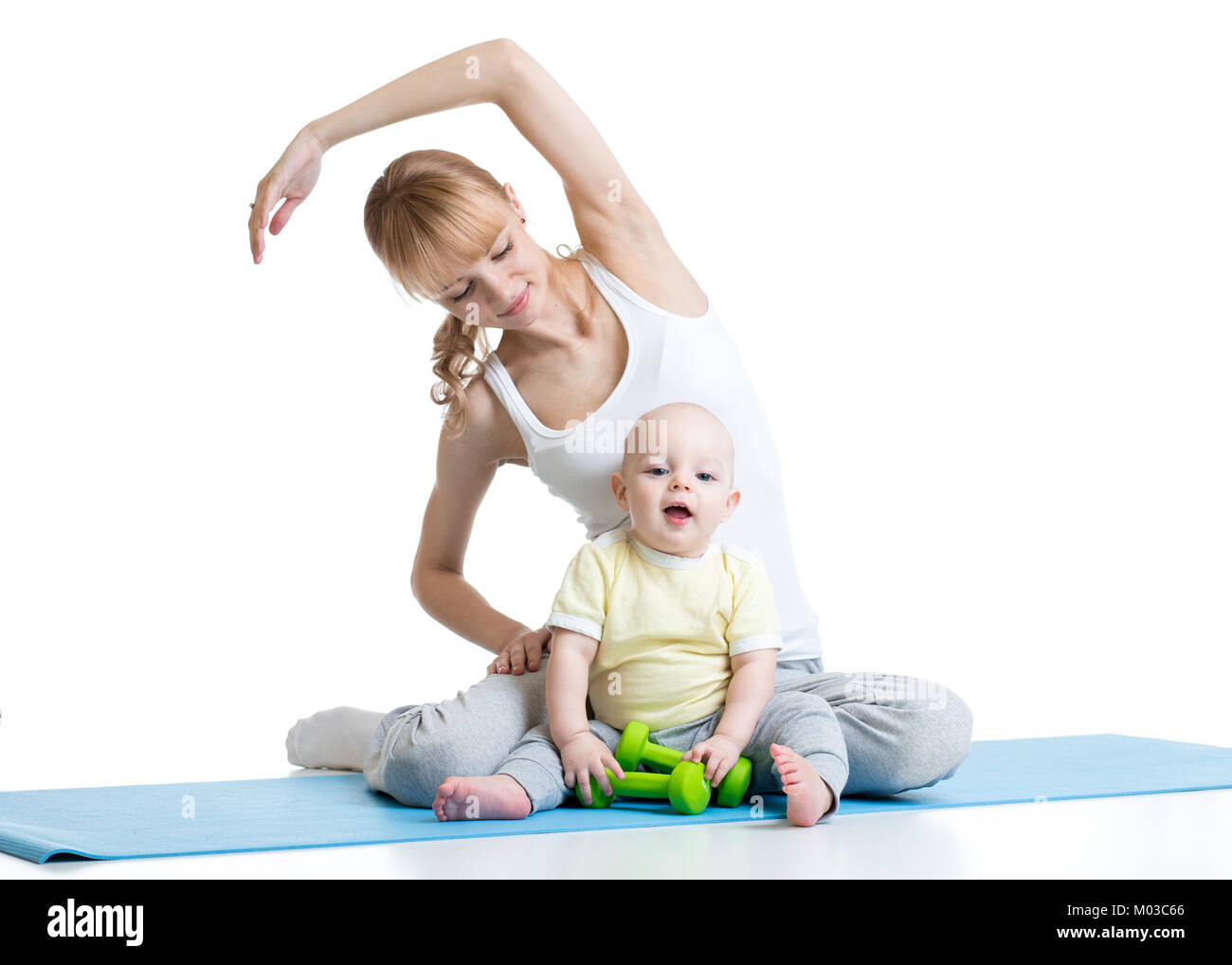 mom with baby doing gymnastics and fitness exercises Stock Photo - Alamy