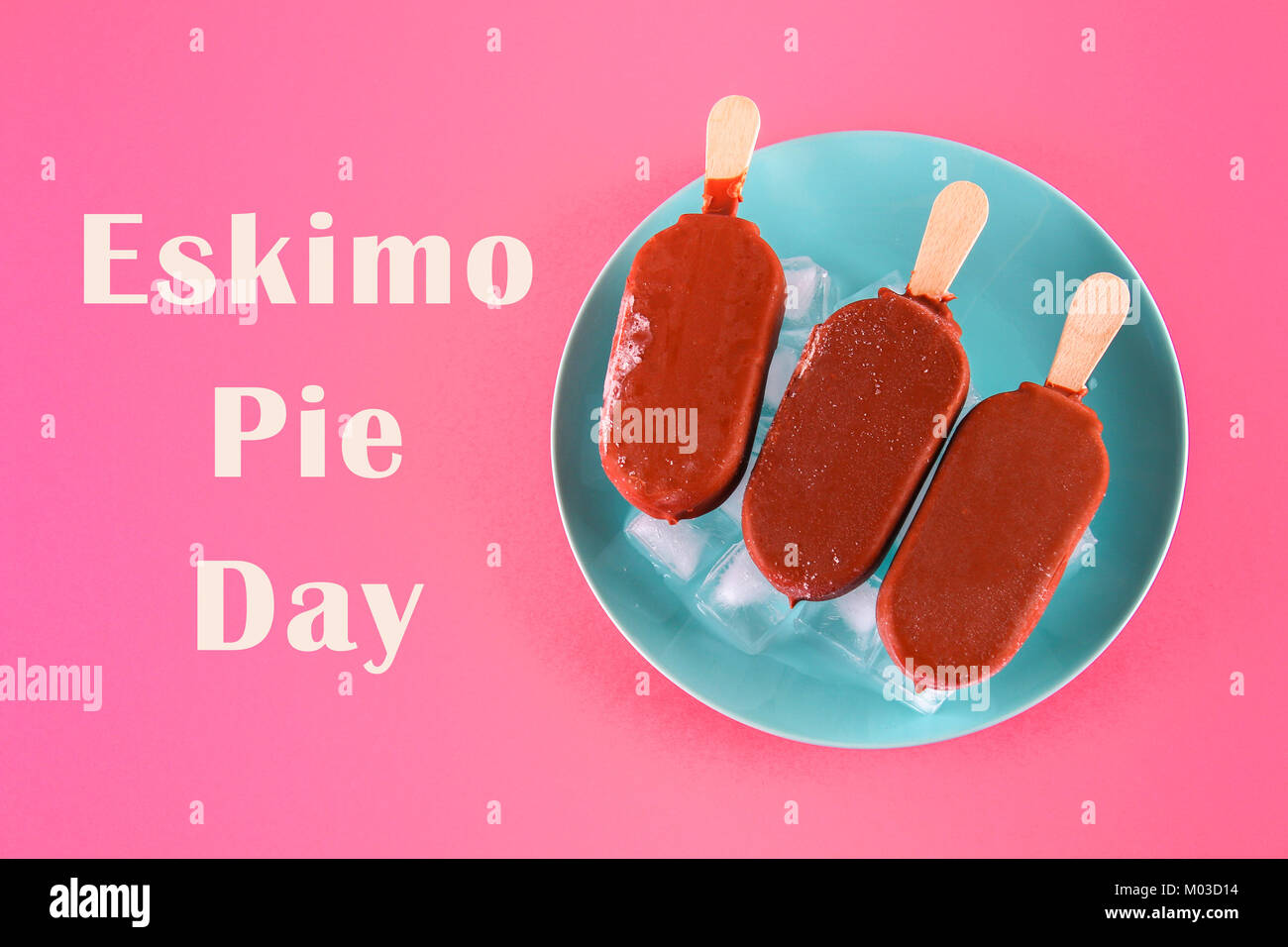 Ice cream eskimo pie on a stick with text on a pink background. Concept ...