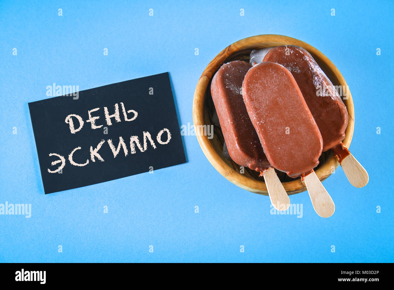 Ice cream eskimo pie on a stick with the text in Russian - Day eskimo ...