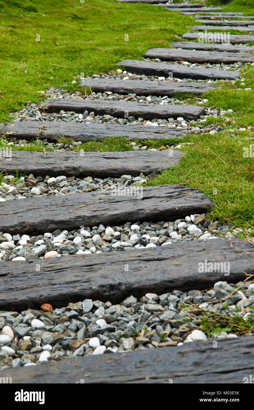 Wooden Stepping Pathway - Old stepping wood along the walk way in the ...