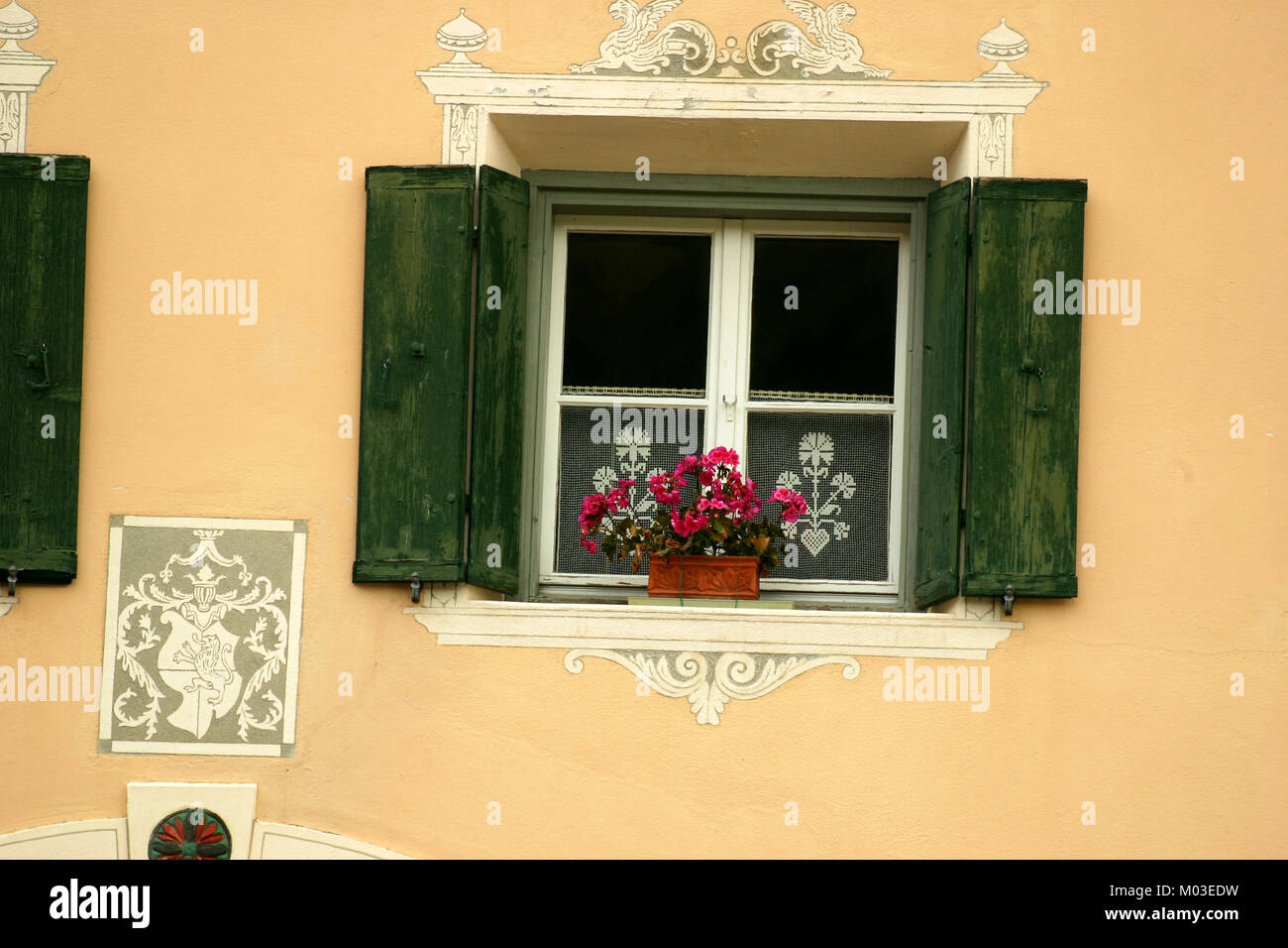 Beautifully ornamented windows in the village of Guarda, Switzerland ...