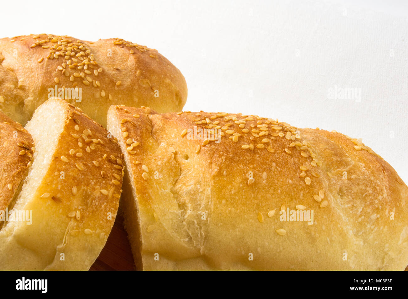 sliced whole wheat breads on a chopping Board Stock Photo - Alamy