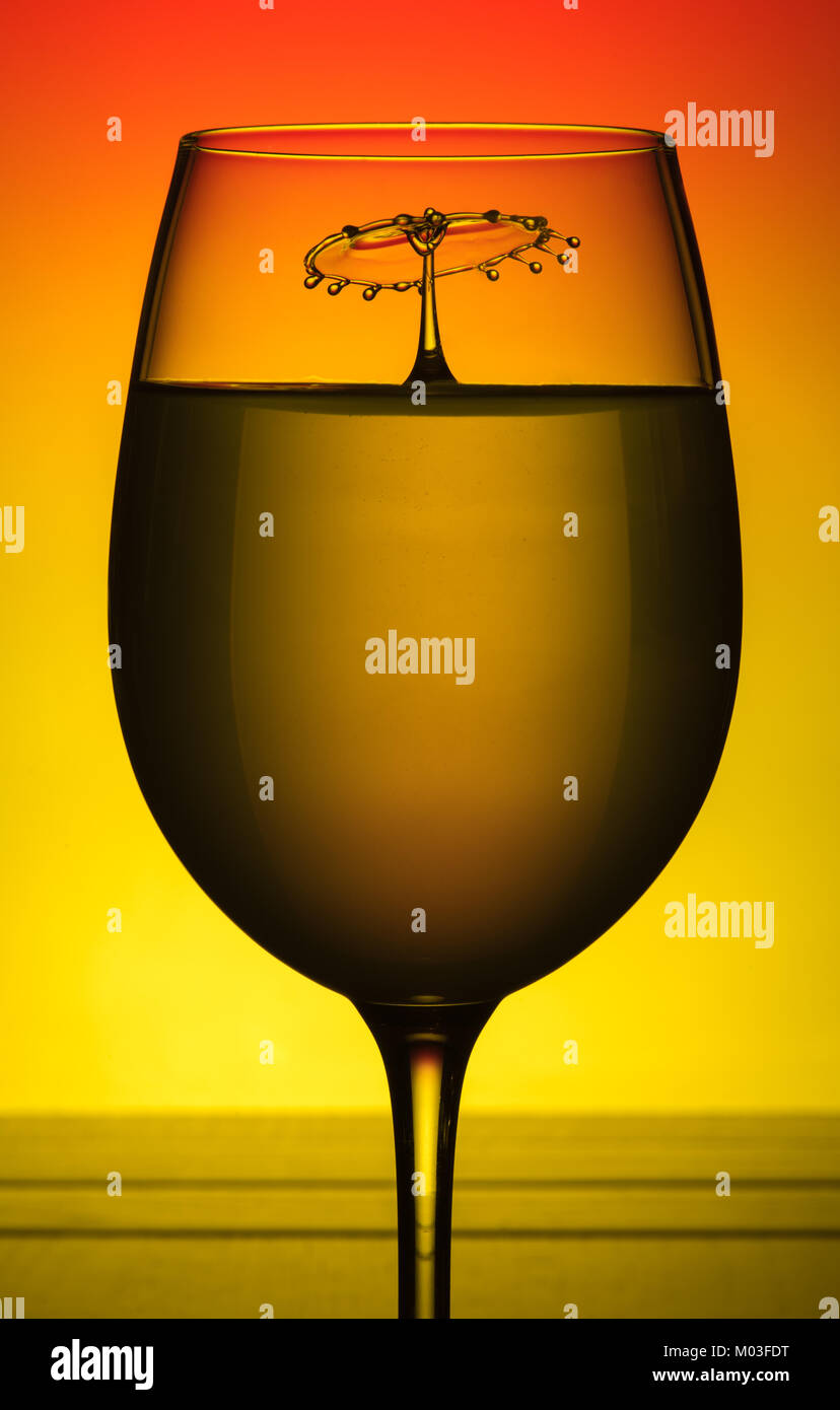 Water Droplet splash in a glass Stock Photo - Alamy