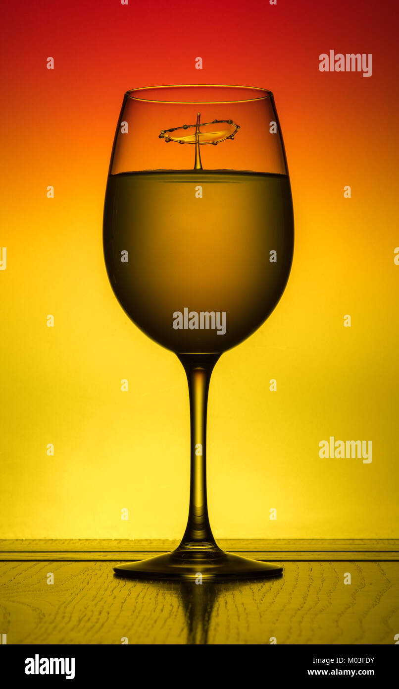 Water Droplet splash in a glass Stock Photo - Alamy