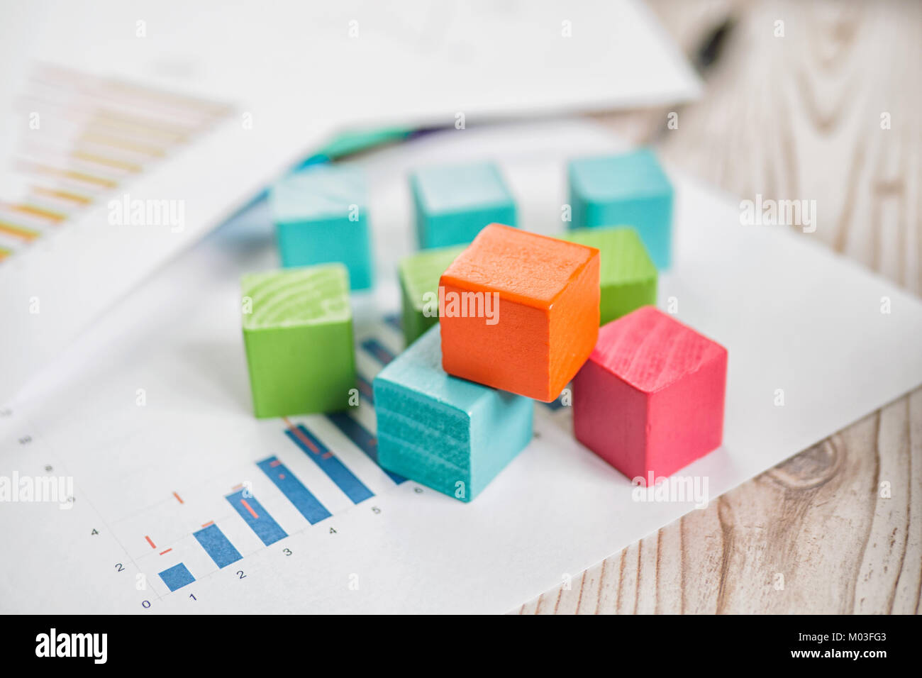 building blocks with bar chart graph Stock Photo - Alamy