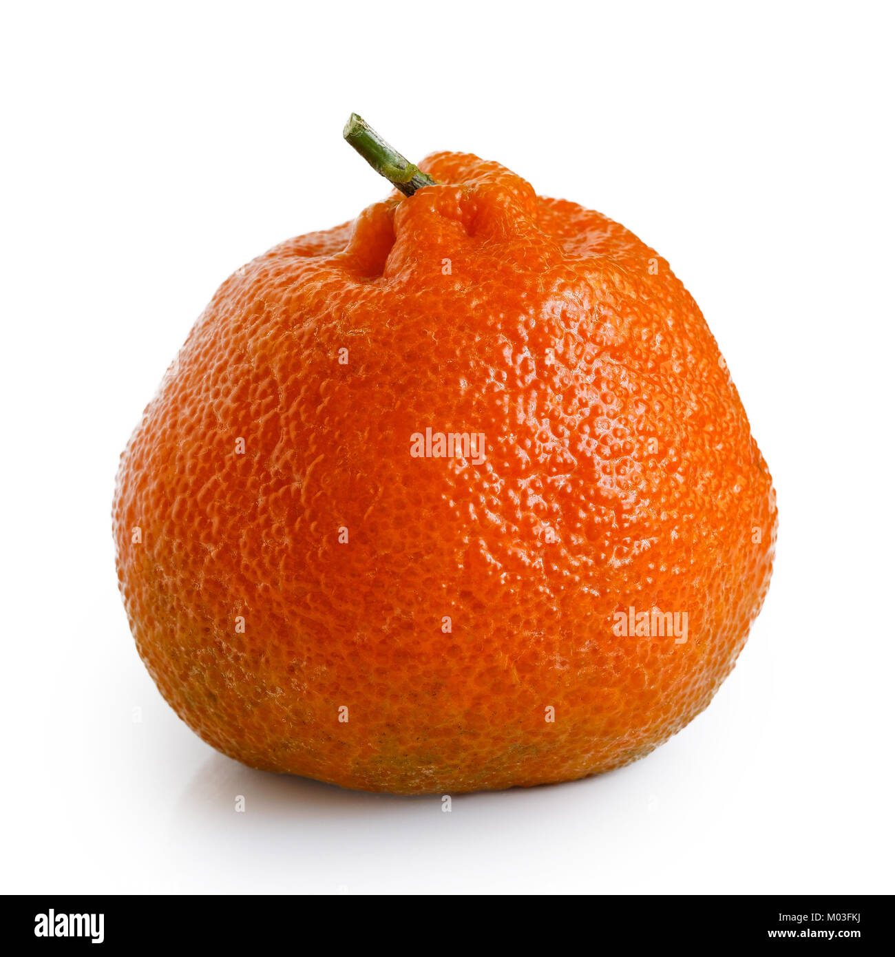 A single whole mandarin with a stem isolated on white Stock Photo - Alamy