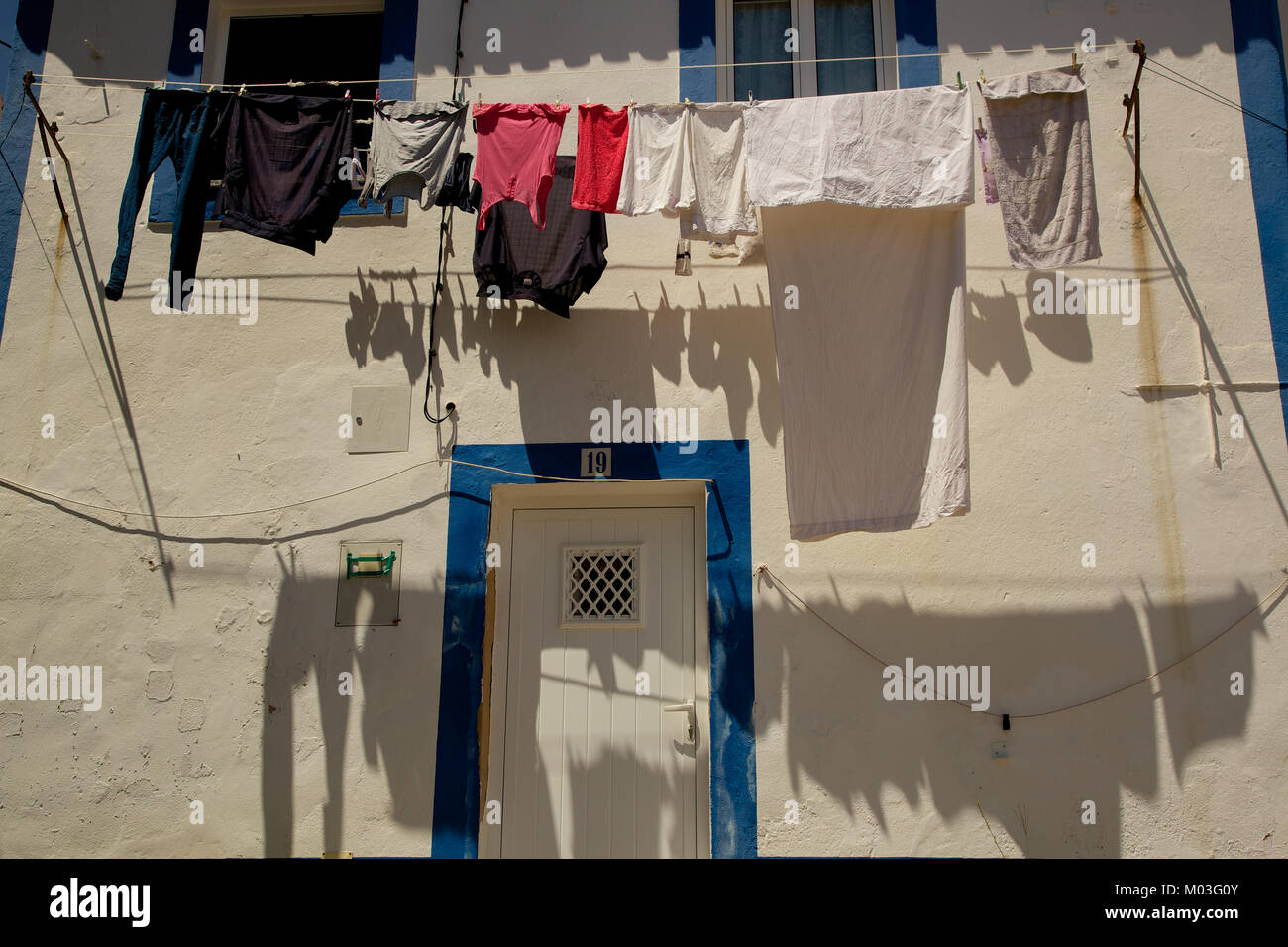 Street scenes and washing line, in the hilltop town of Monchique ...