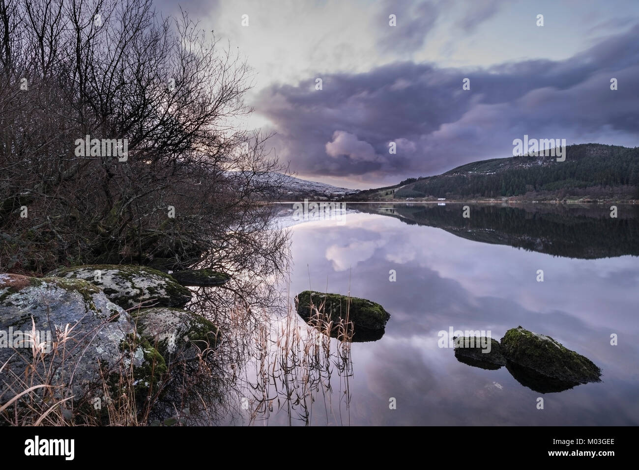 Beautiful sunrise landscape image in Winter of Llyn Cwellyn in ...