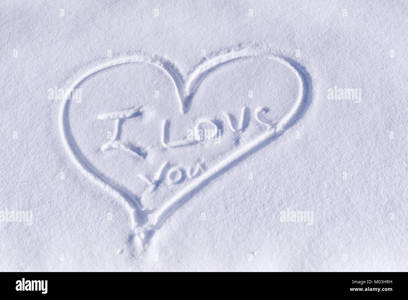 Heart written snow hi-res stock photography and images - Alamy